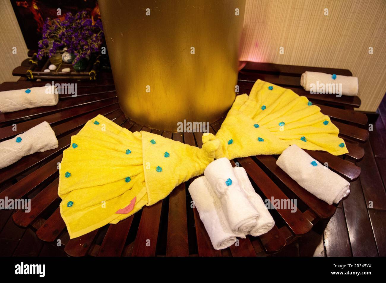 Spa towels folded and shown in display Stock Photo - Alamy