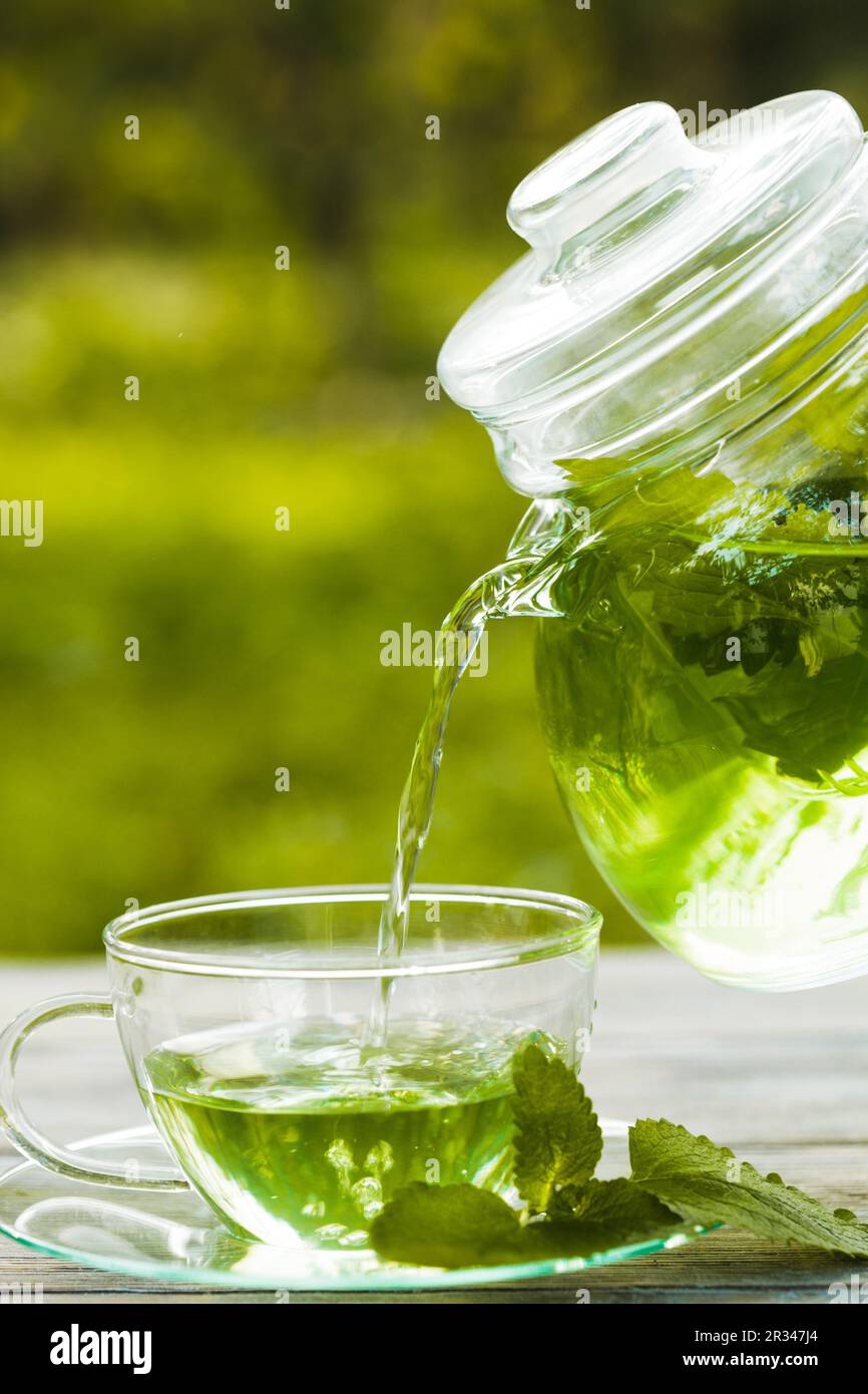 Teapot pouring mint tea glass hi-res stock photography and images - Alamy