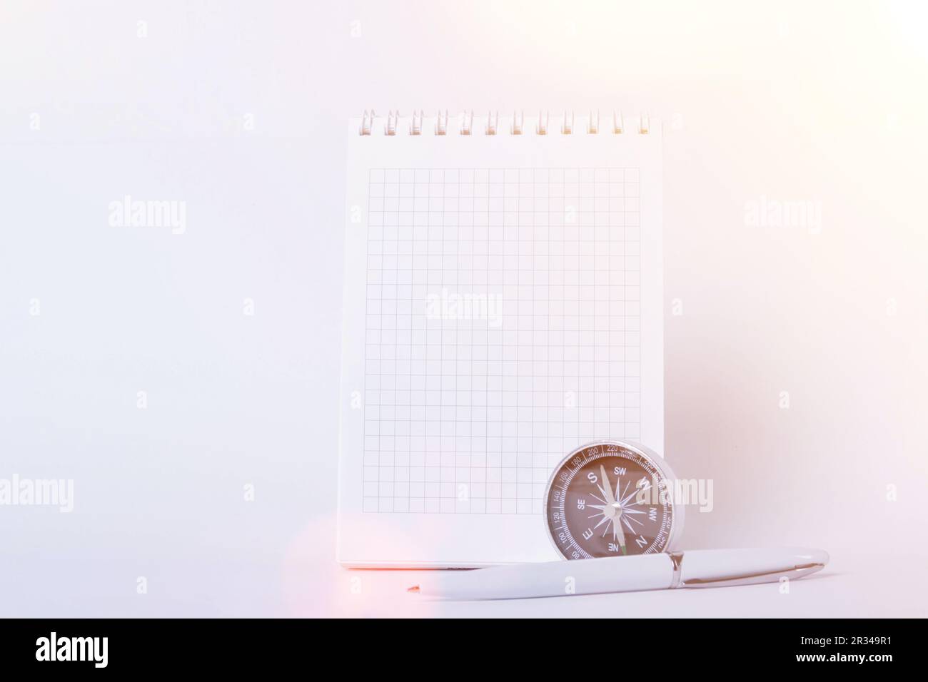 Traveler's notes. A clean notebook with a pen for writing a compass and ...