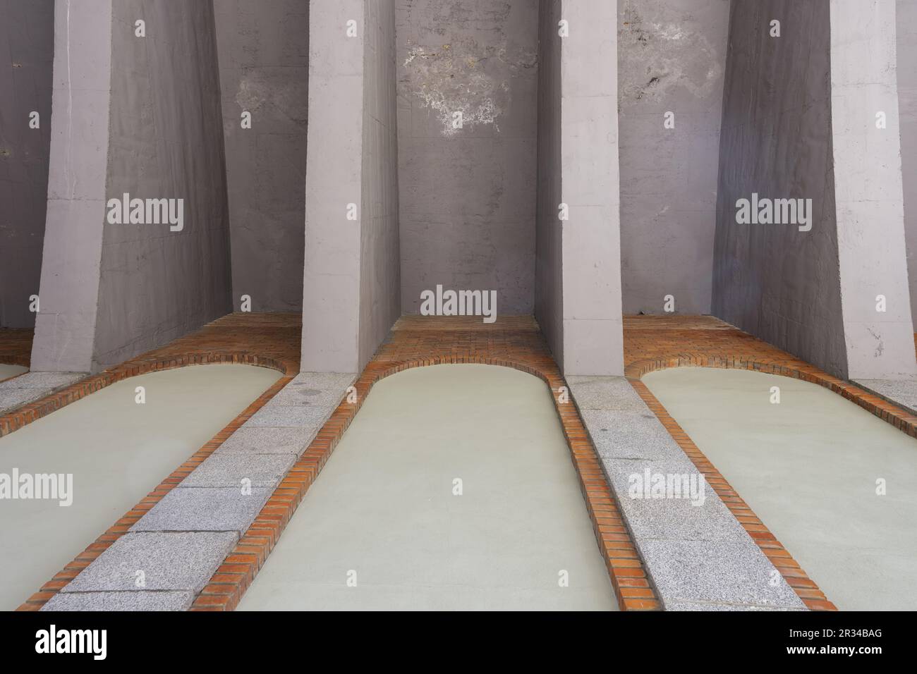 Wall and deck of an urban bridge built with bricks, concrete and gray ...