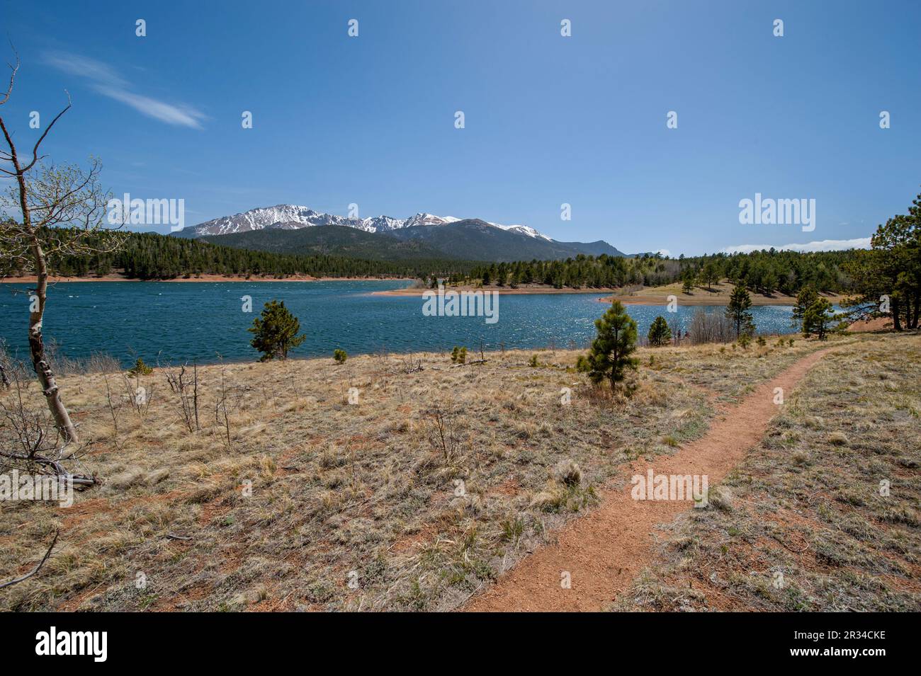 Colorado's Pike's Peak looms above Crystal Reservoir, which lies along ...