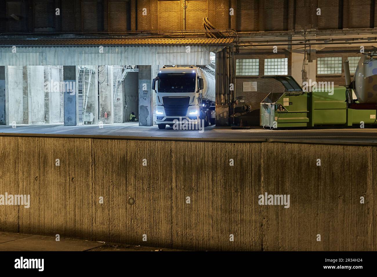 Cargo truck at factory gate Stock Photo - Alamy