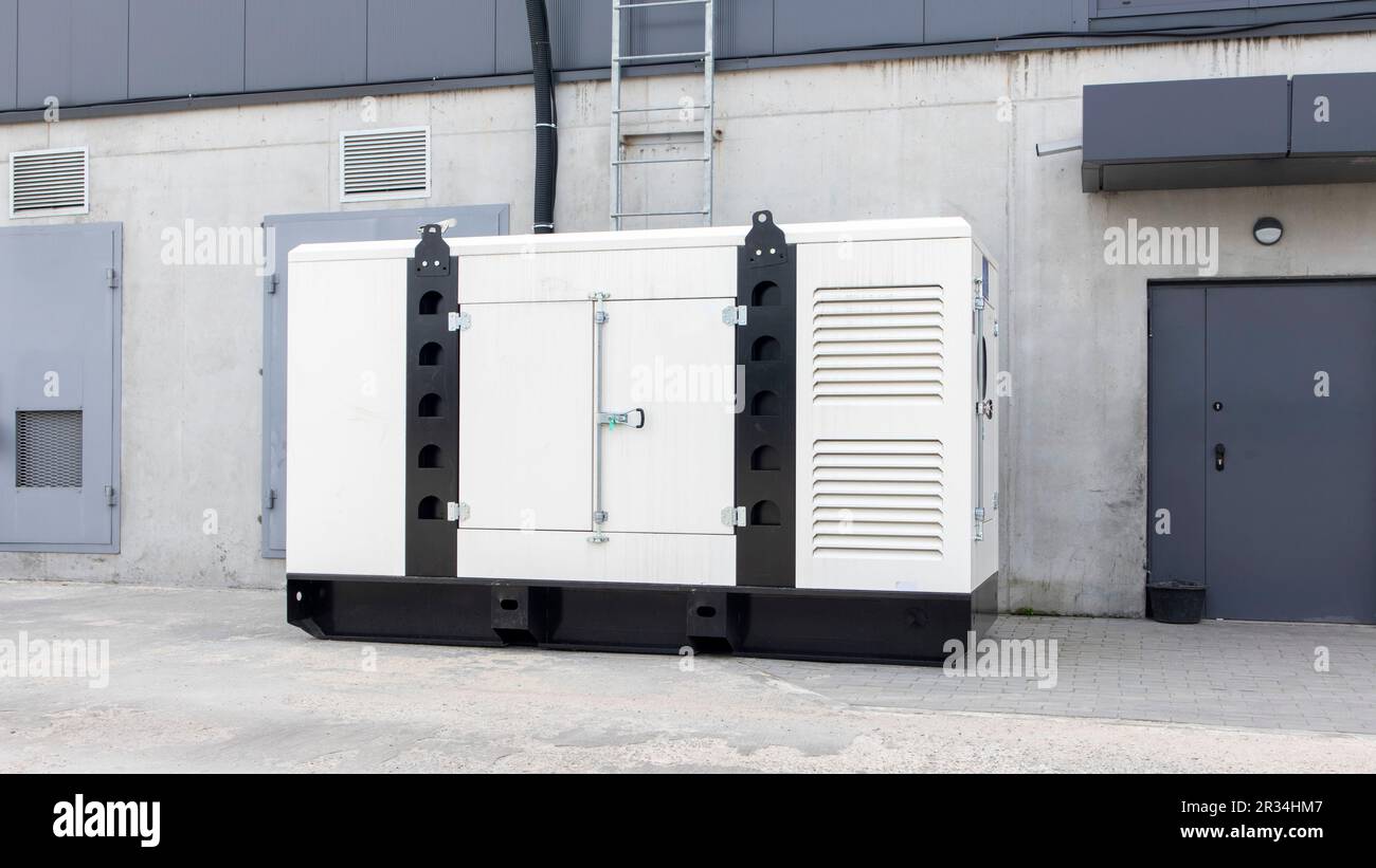 White auxiliary diesel generator for emergency power supply. Industrial ...