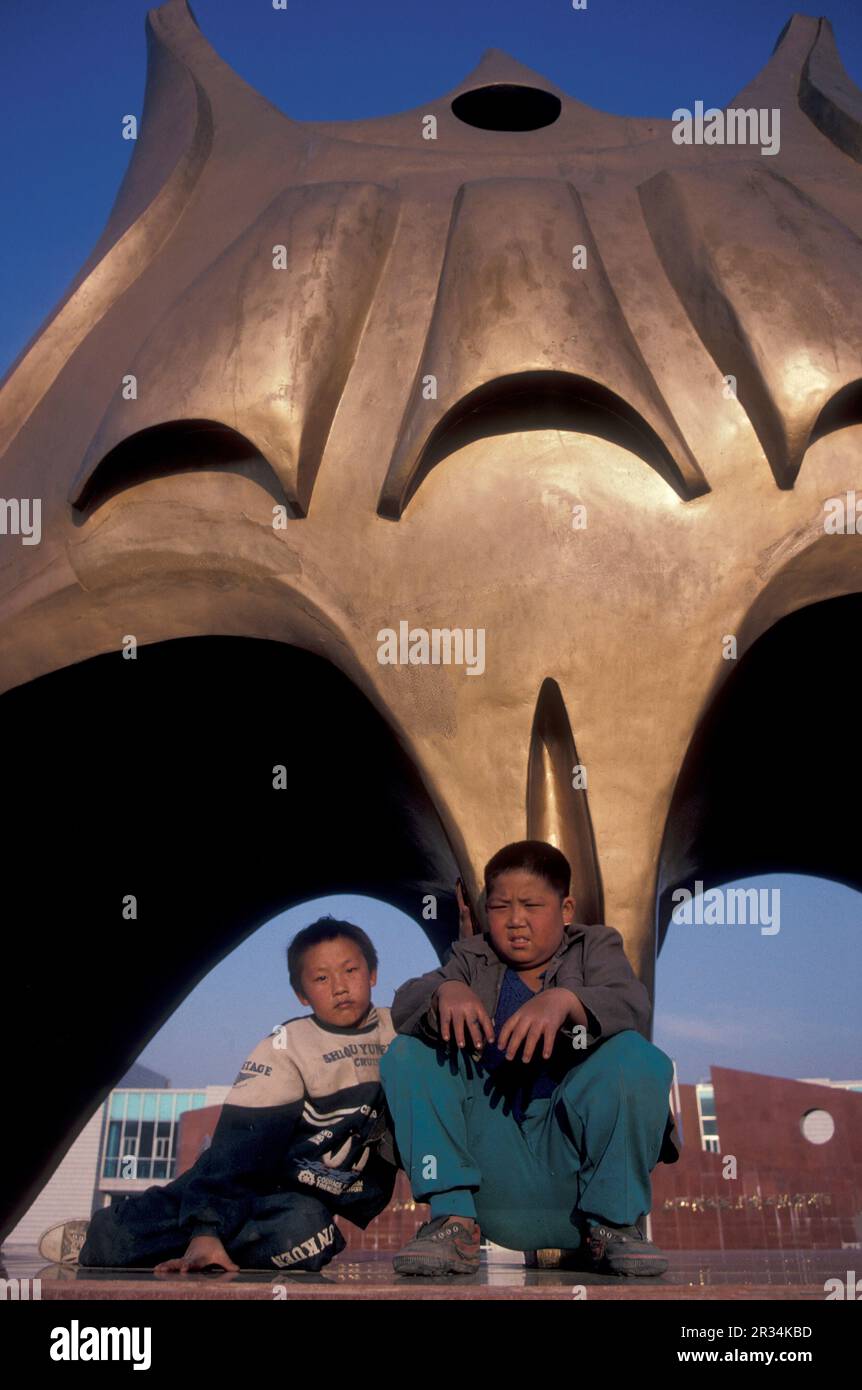 a Boy at monument a the Airport of Mengshi Dehong in the province of ...