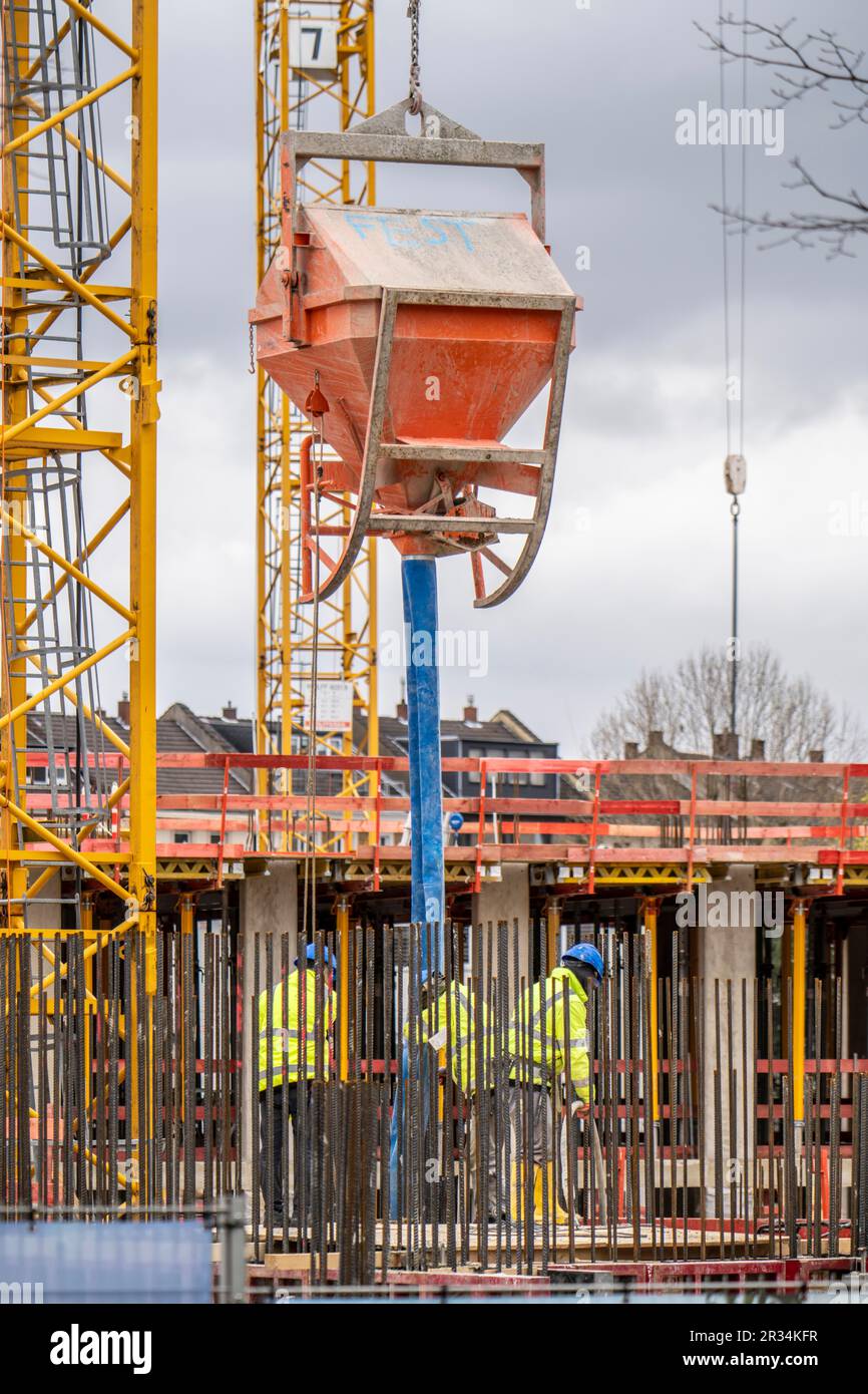 Concrete work, concrete bomb, on a large construction site building a ...