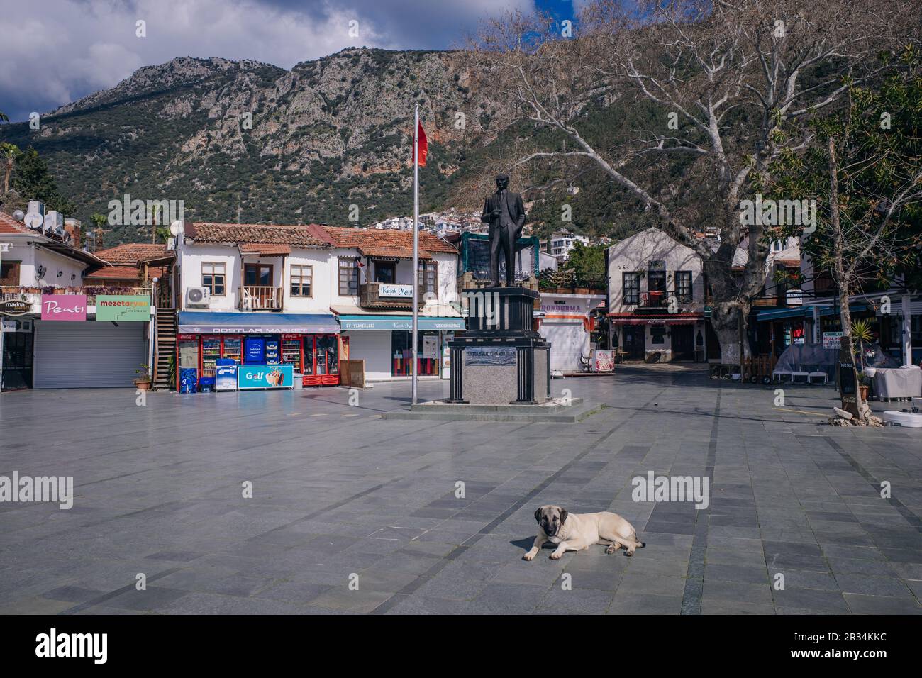 Beautiful street in the Kas old town with boutique shops at sunset ...