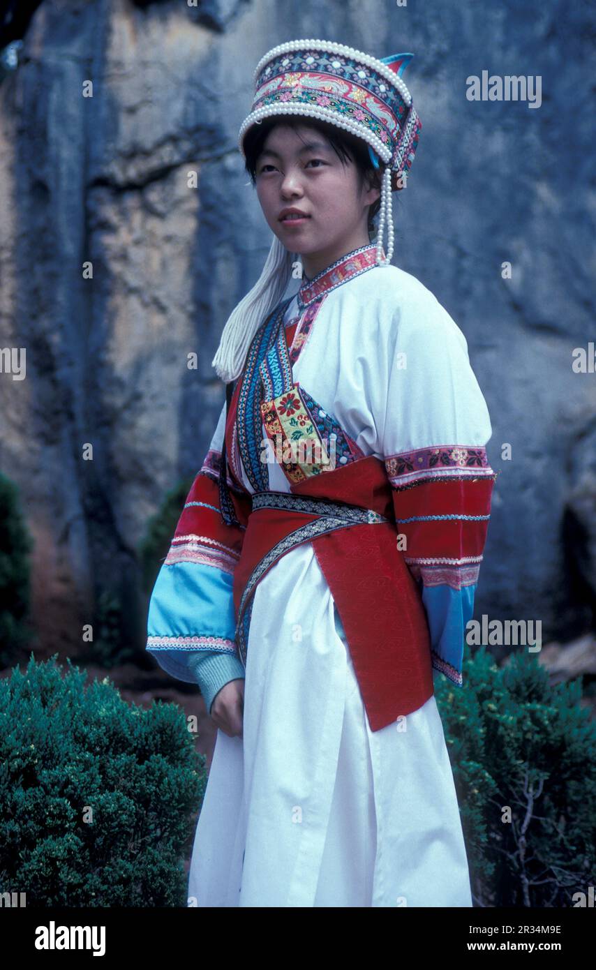 people in traditional costume of chinese minorities posing at the ...