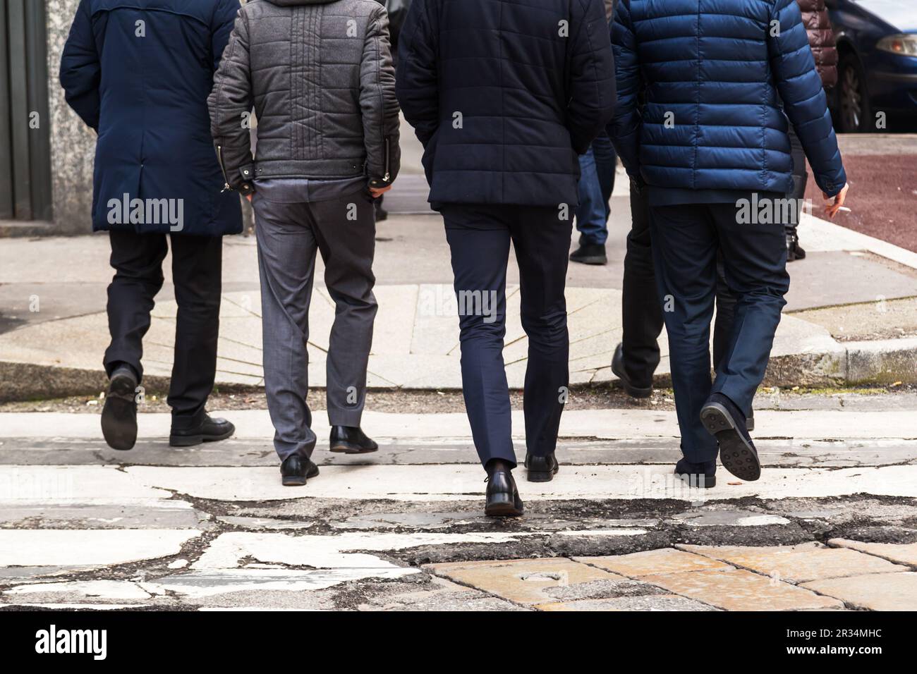 Men crossing hi-res stock photography and images - Alamy