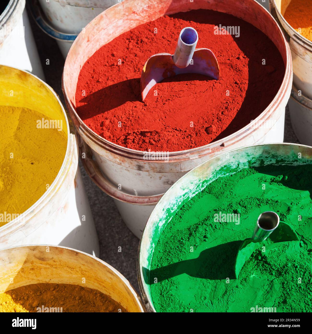 Bucket with color pigments Stock Photo - Alamy
