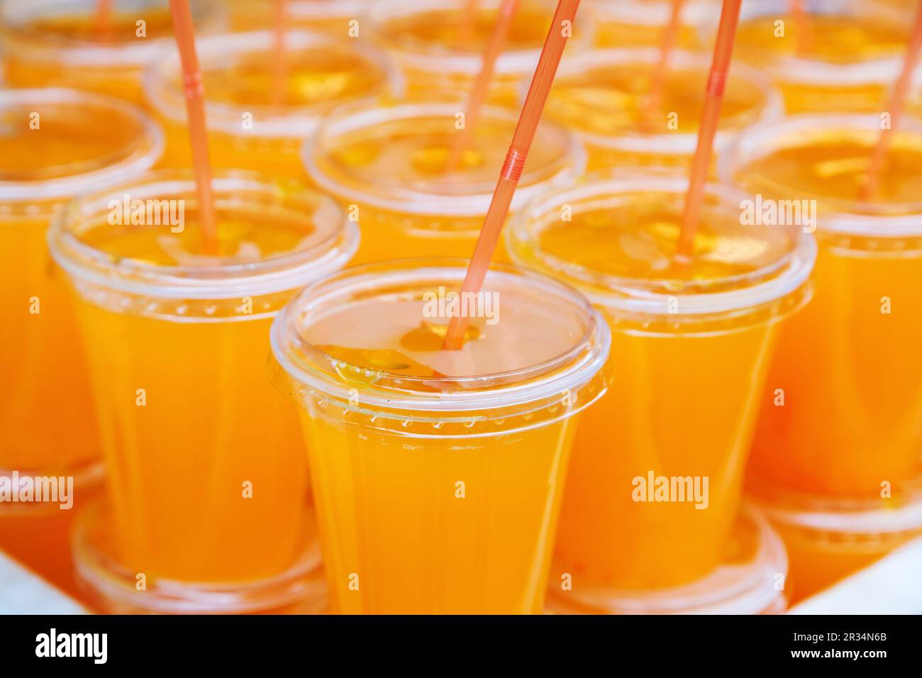Cup with orange juice Stock Photo - Alamy