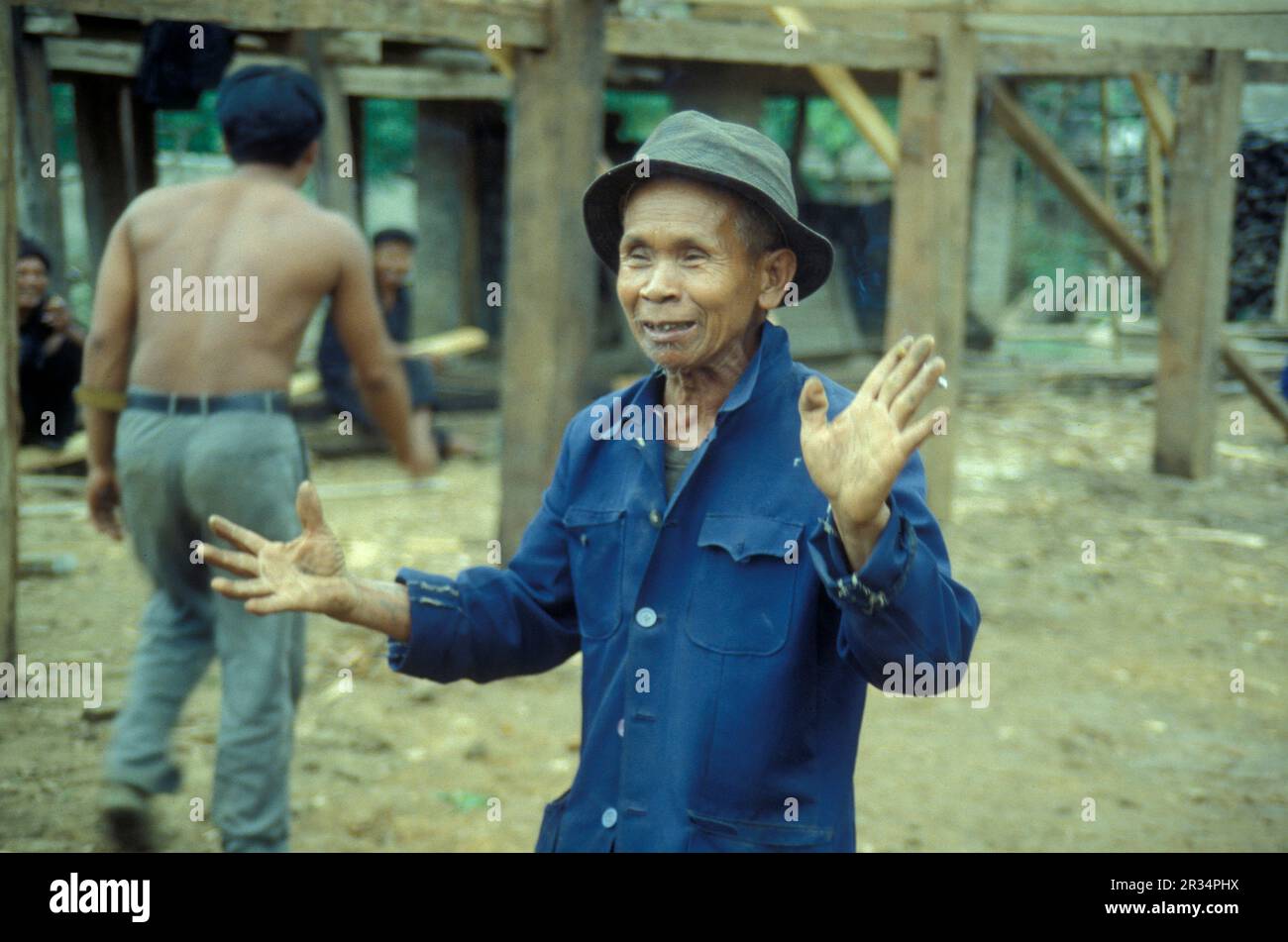 a men at work to buiding a new woodhouse in a Village in the ...
