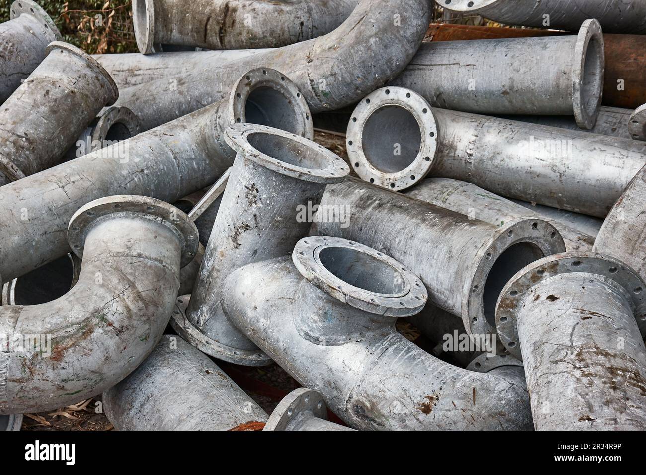 Old metal pipes in a pile Stock Photo - Alamy