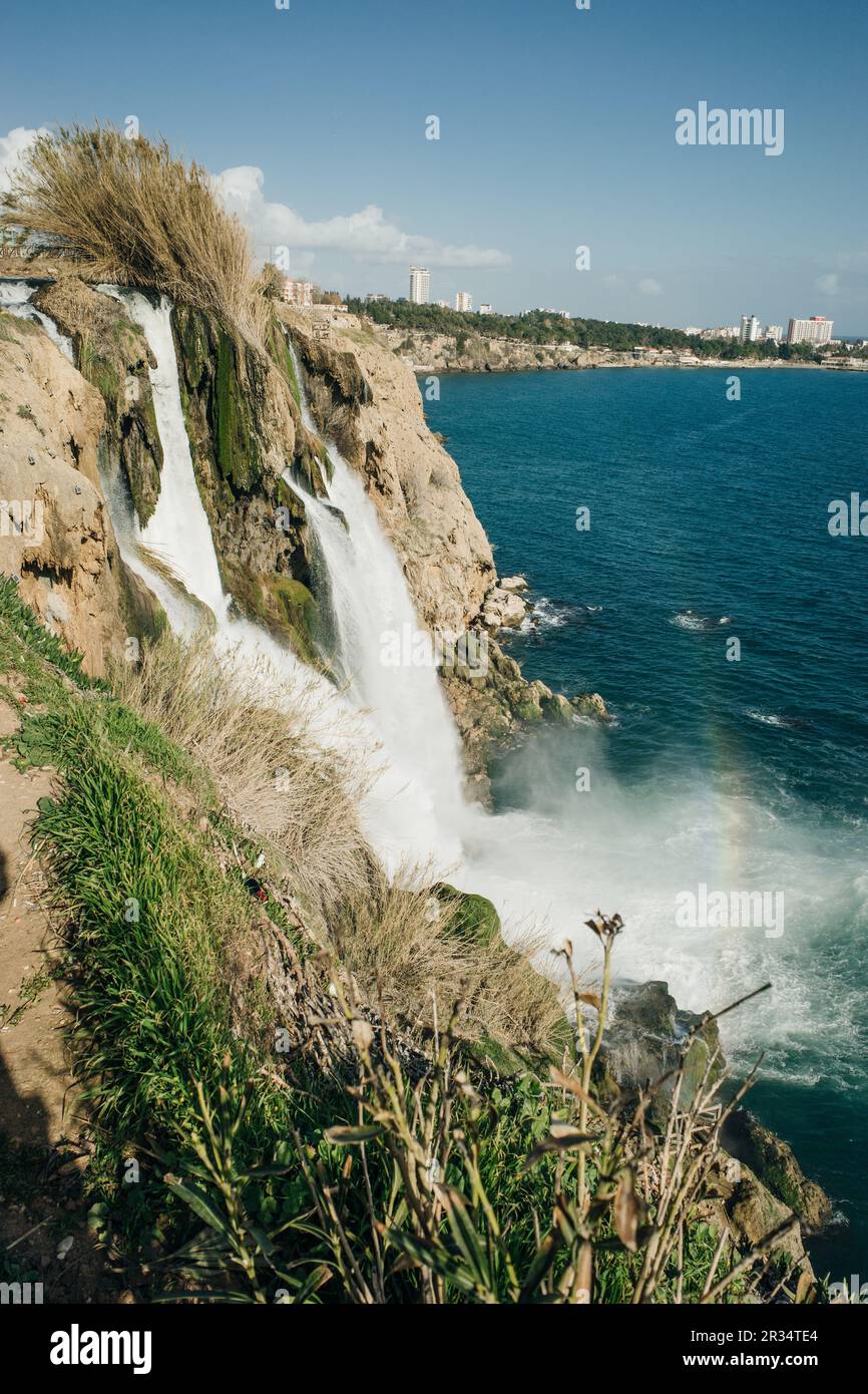 Lower Duden Falls drop off a rocky cliff falling from about 40 m into ...