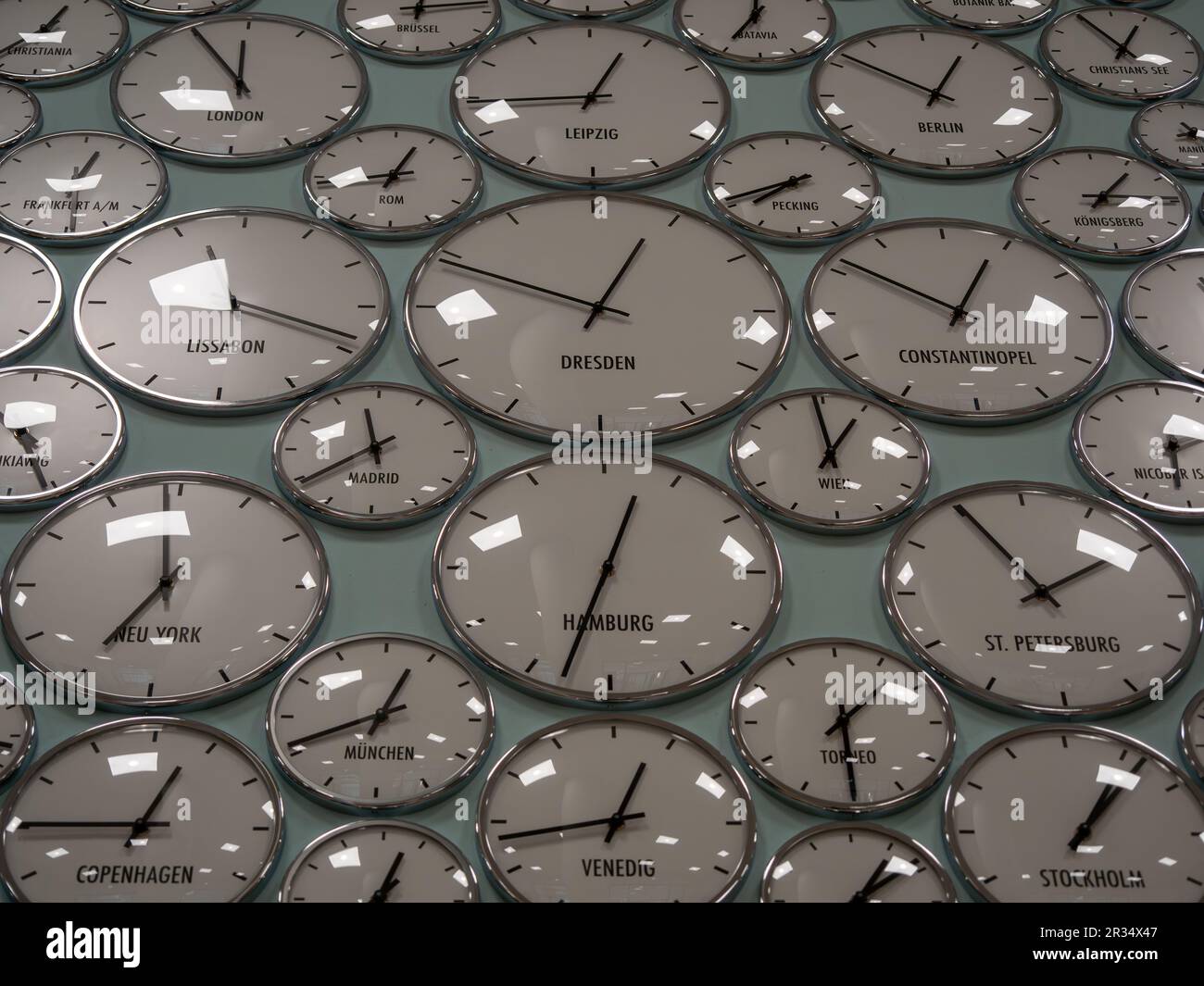 Wall Clock with the time of different European cities in Berlin. Clock ...