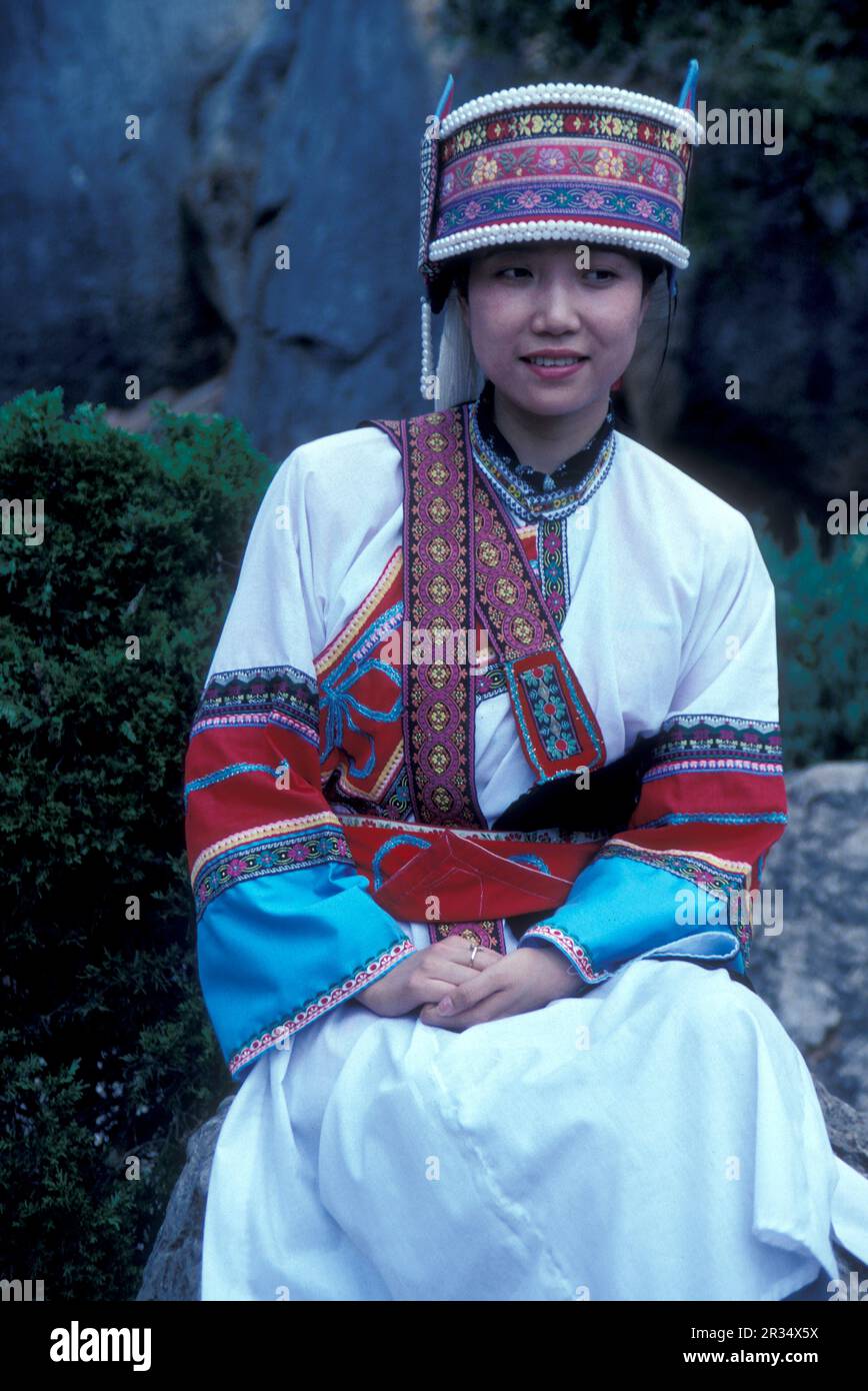 people in traditional costume of chinese minorities posing at the ...