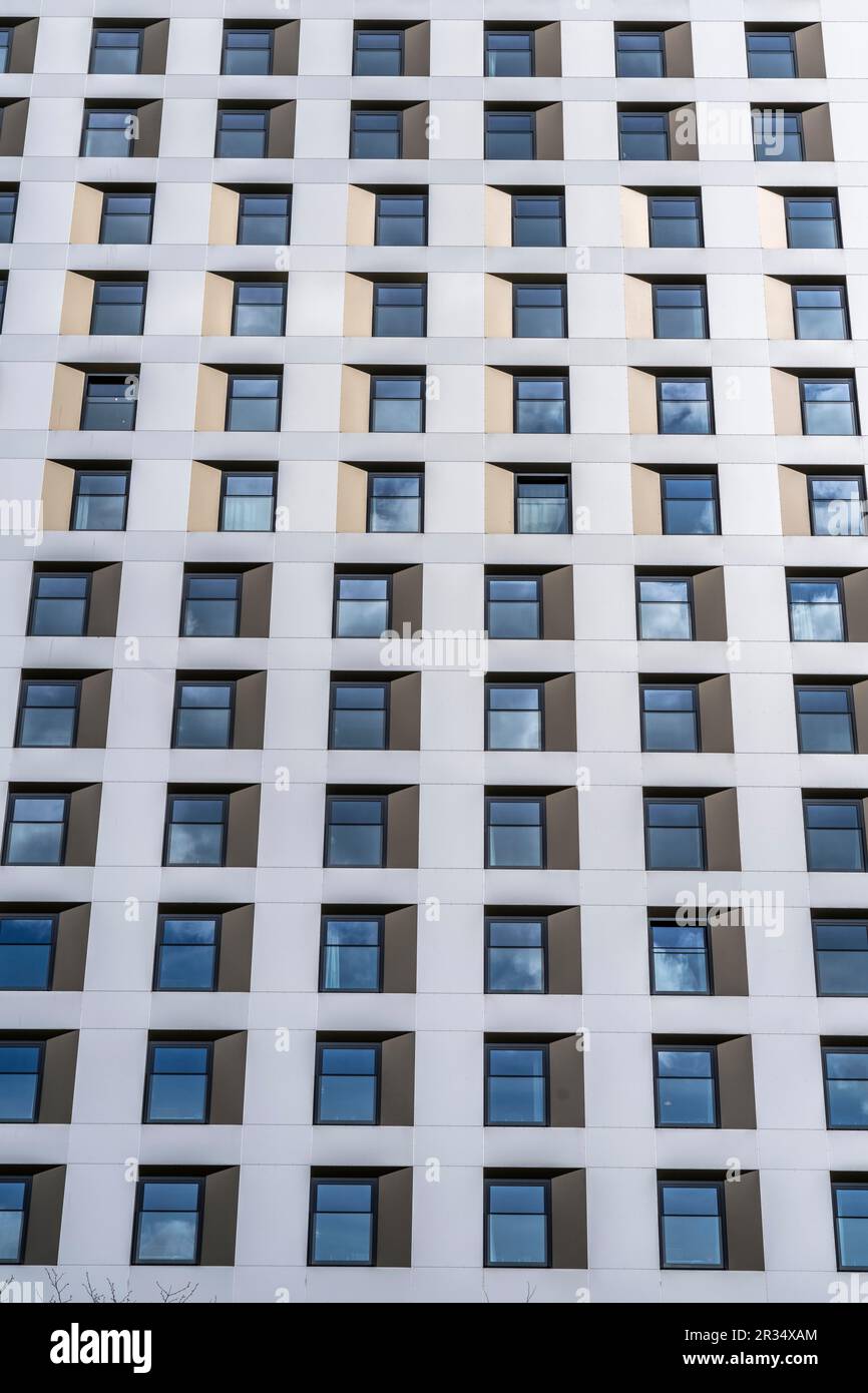 Facade of a modern building, many windows, high-rise Stock Photo - Alamy