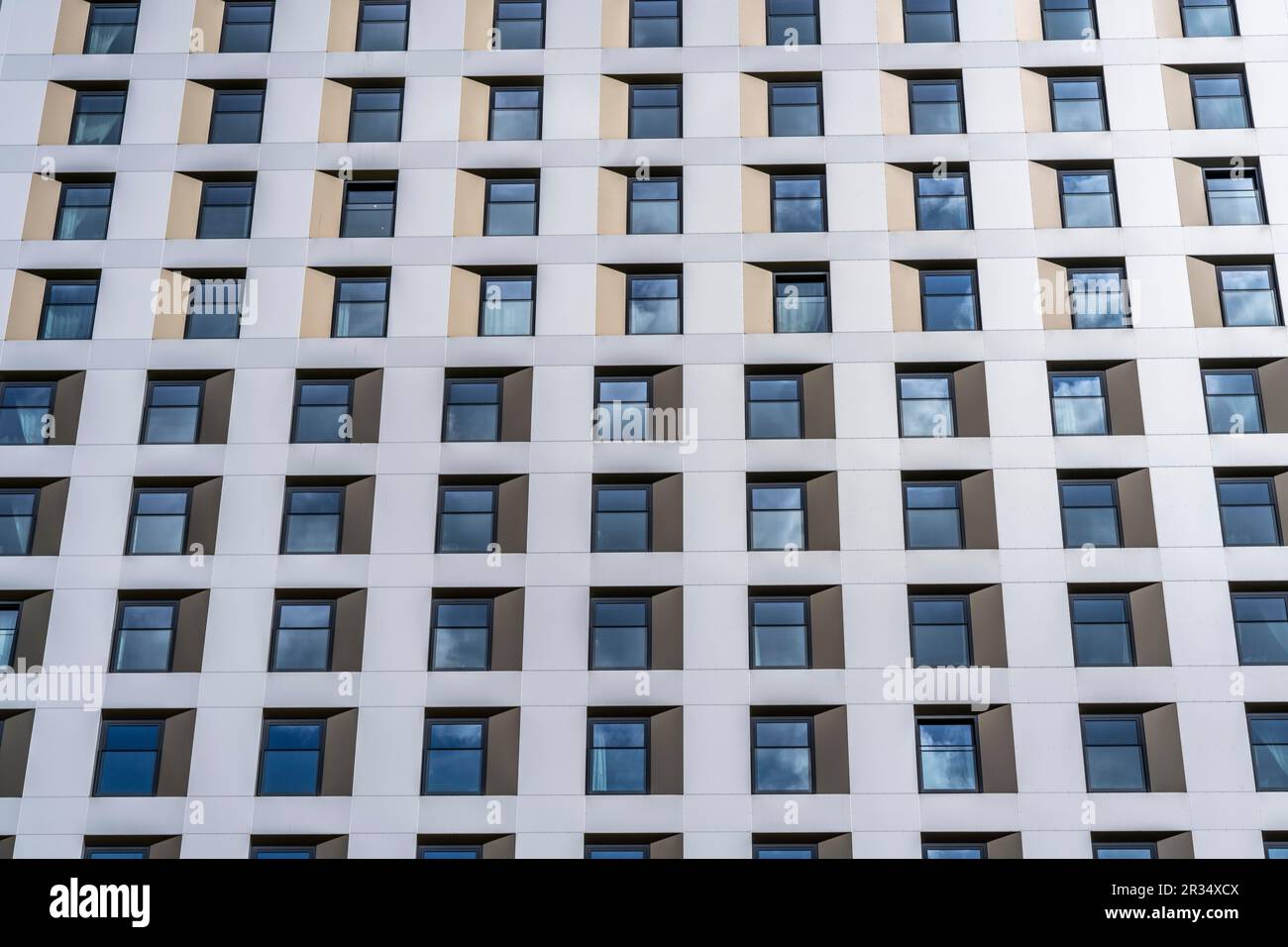 Facade of a modern building, many windows, high-rise Stock Photo - Alamy