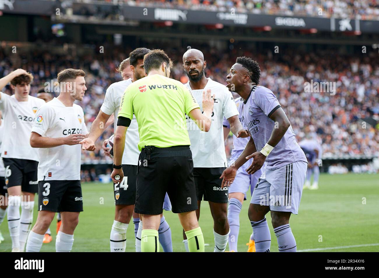 Toni Lato of Valencia CF, Eray Comert of Valencia CF, Dimitri Foulquier ...