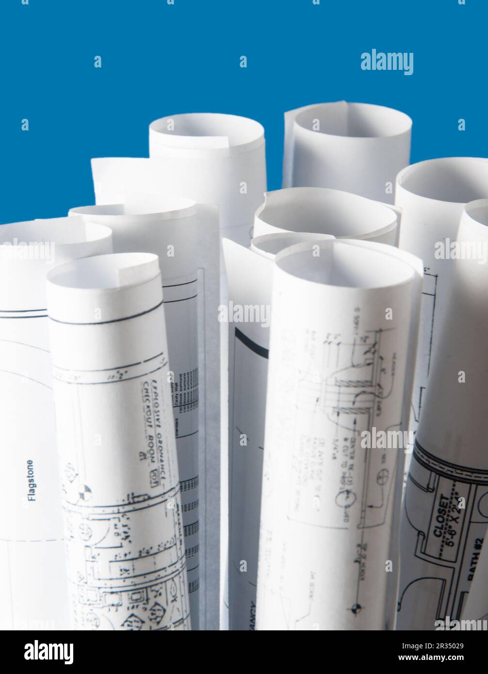 Rolls of architecture blueprints and house plans Stock Photo - Alamy