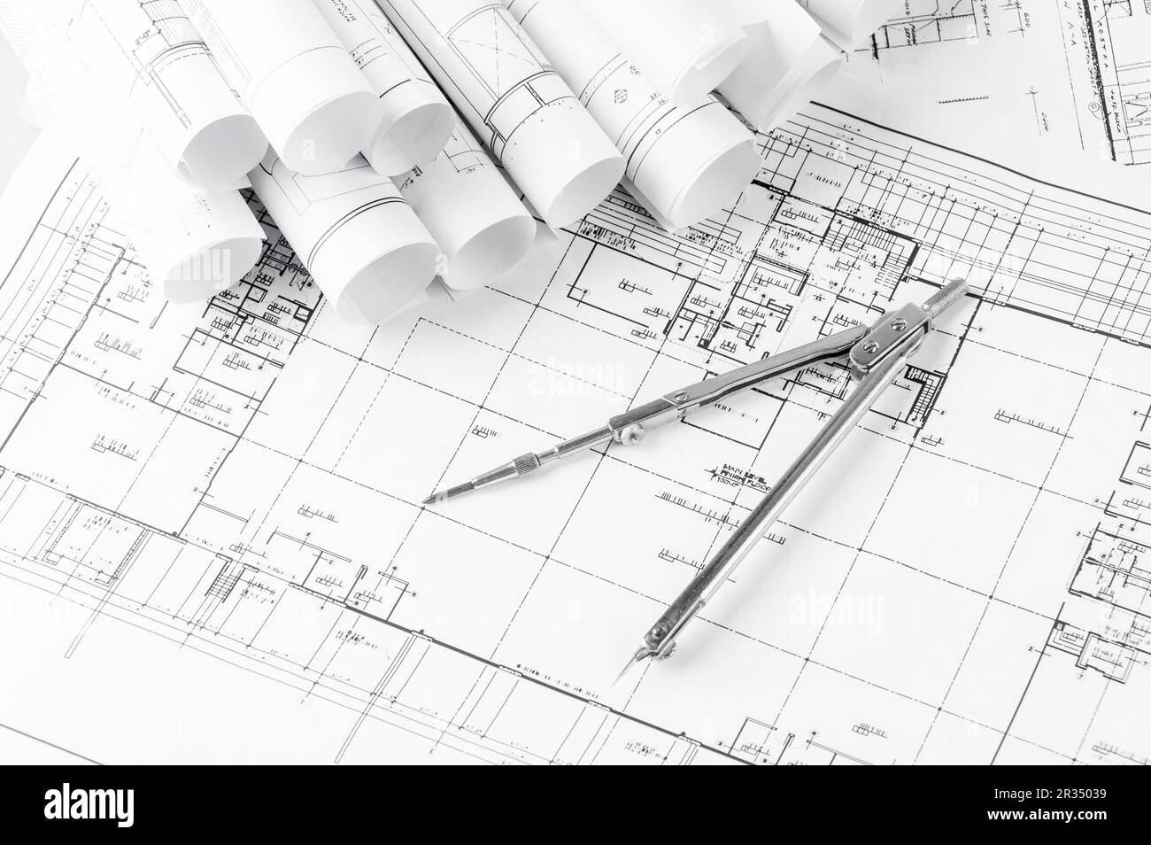 Rolls of architecture blueprints and house plans Stock Photo - Alamy