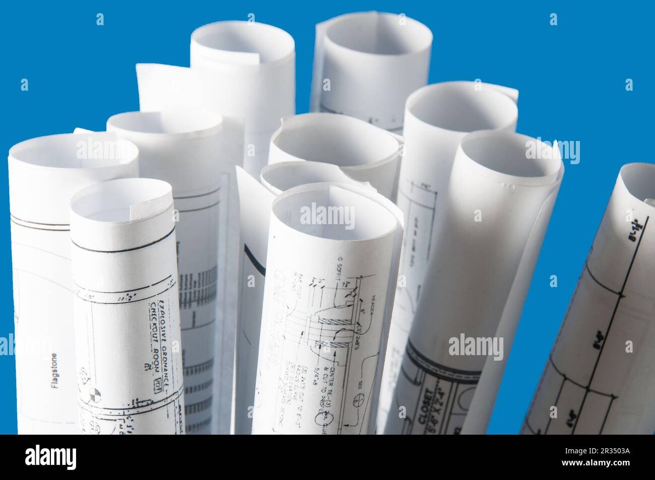 Rolls of architecture blueprints and house plans Stock Photo - Alamy