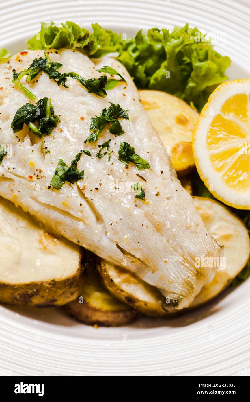 Baked cod fillet Stock Photo - Alamy