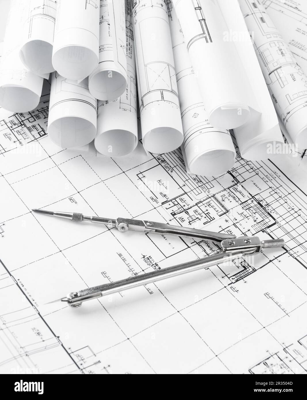 Rolls of architecture blueprints and house plans Stock Photo - Alamy