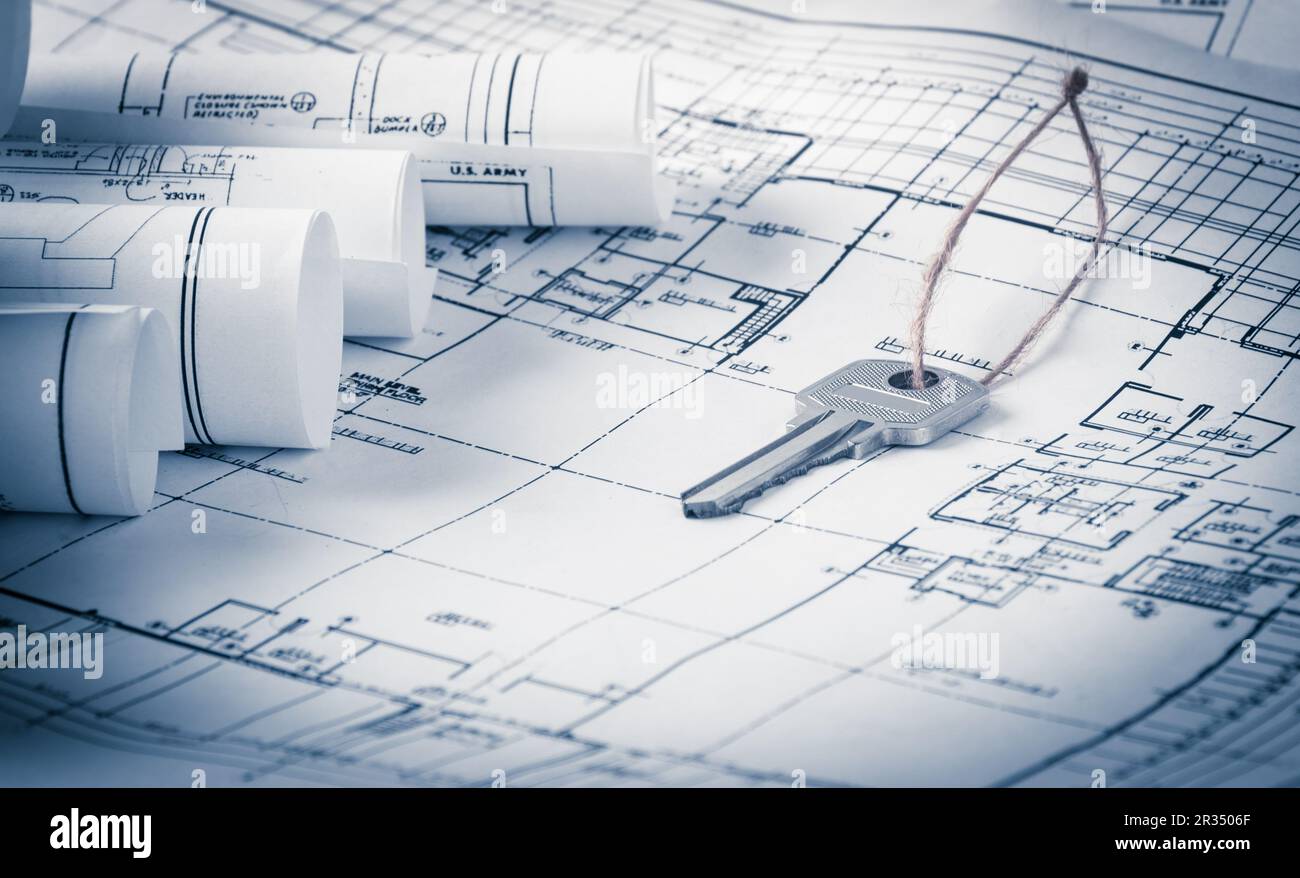 Rolls of architecture blueprints and house plans Stock Photo - Alamy
