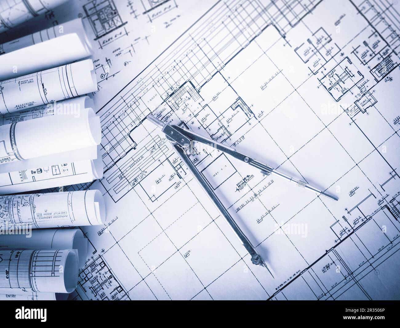 Rolls of architecture blueprints and house plans Stock Photo - Alamy