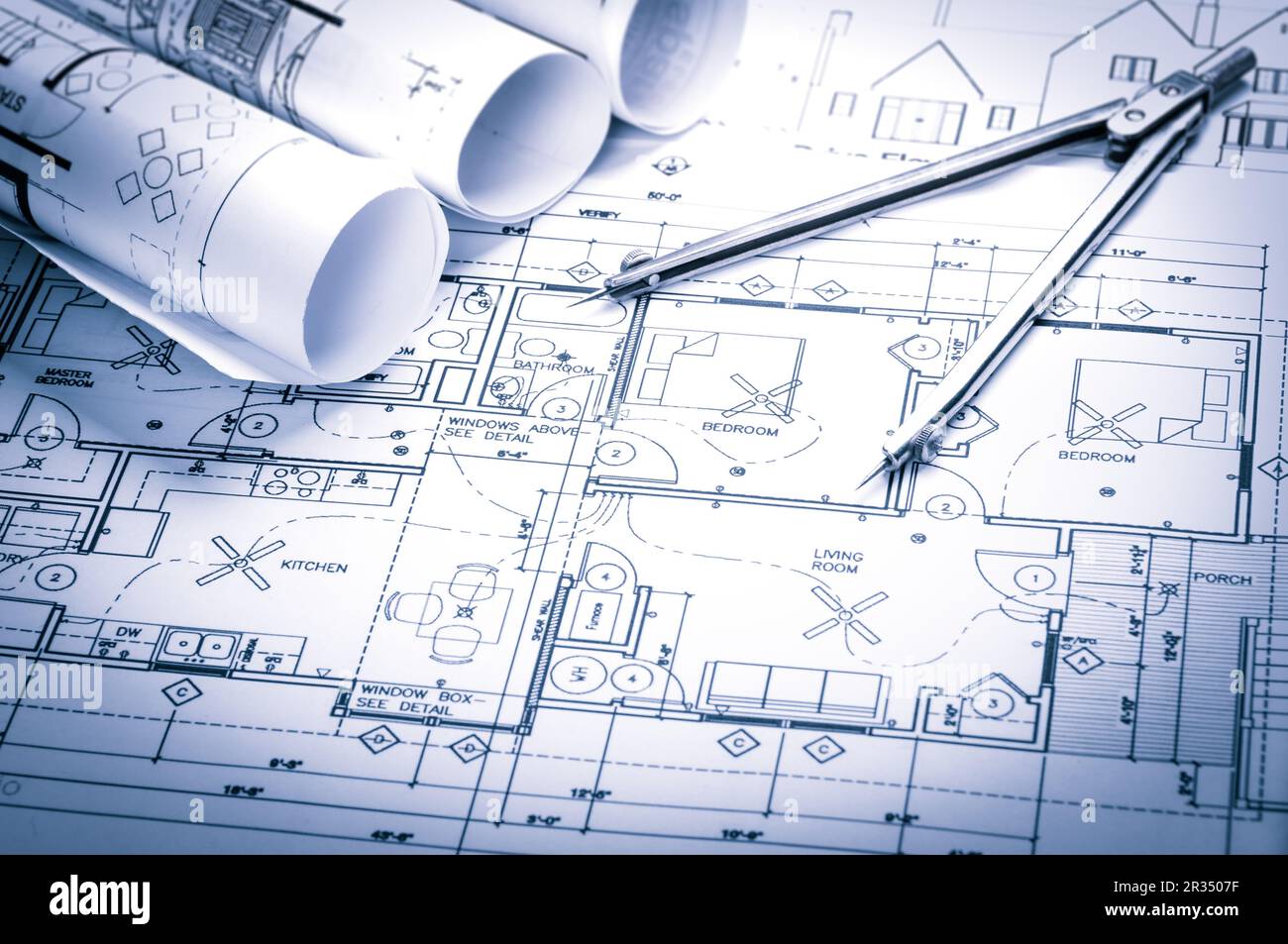 Rolls of architecture blueprints and house plans Stock Photo - Alamy