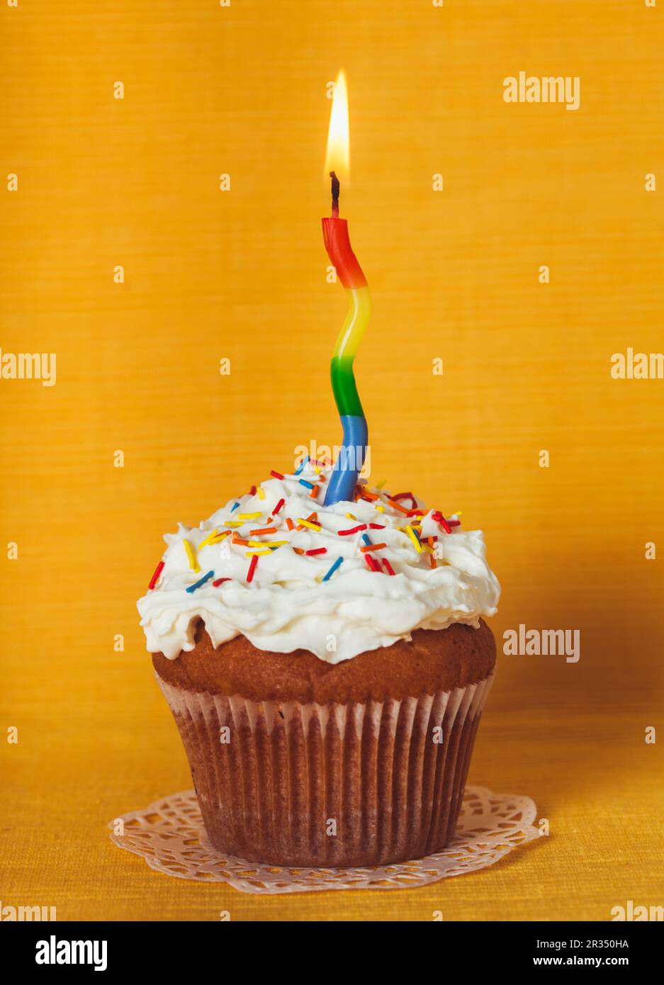 Cupcake with candle Stock Photo - Alamy