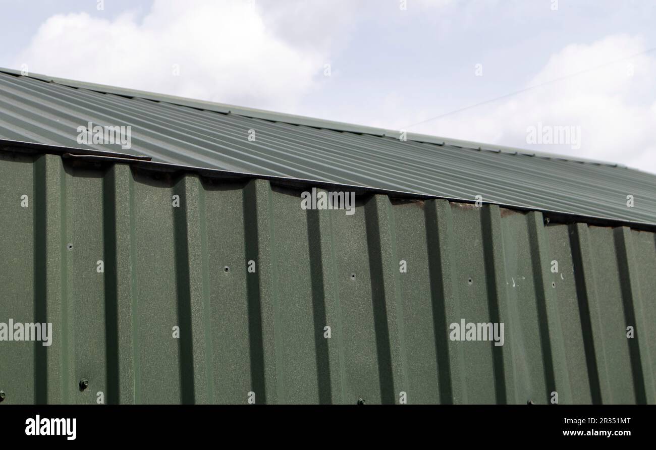 Roofing from a metal profile. Metal roof structure. Textured green ...