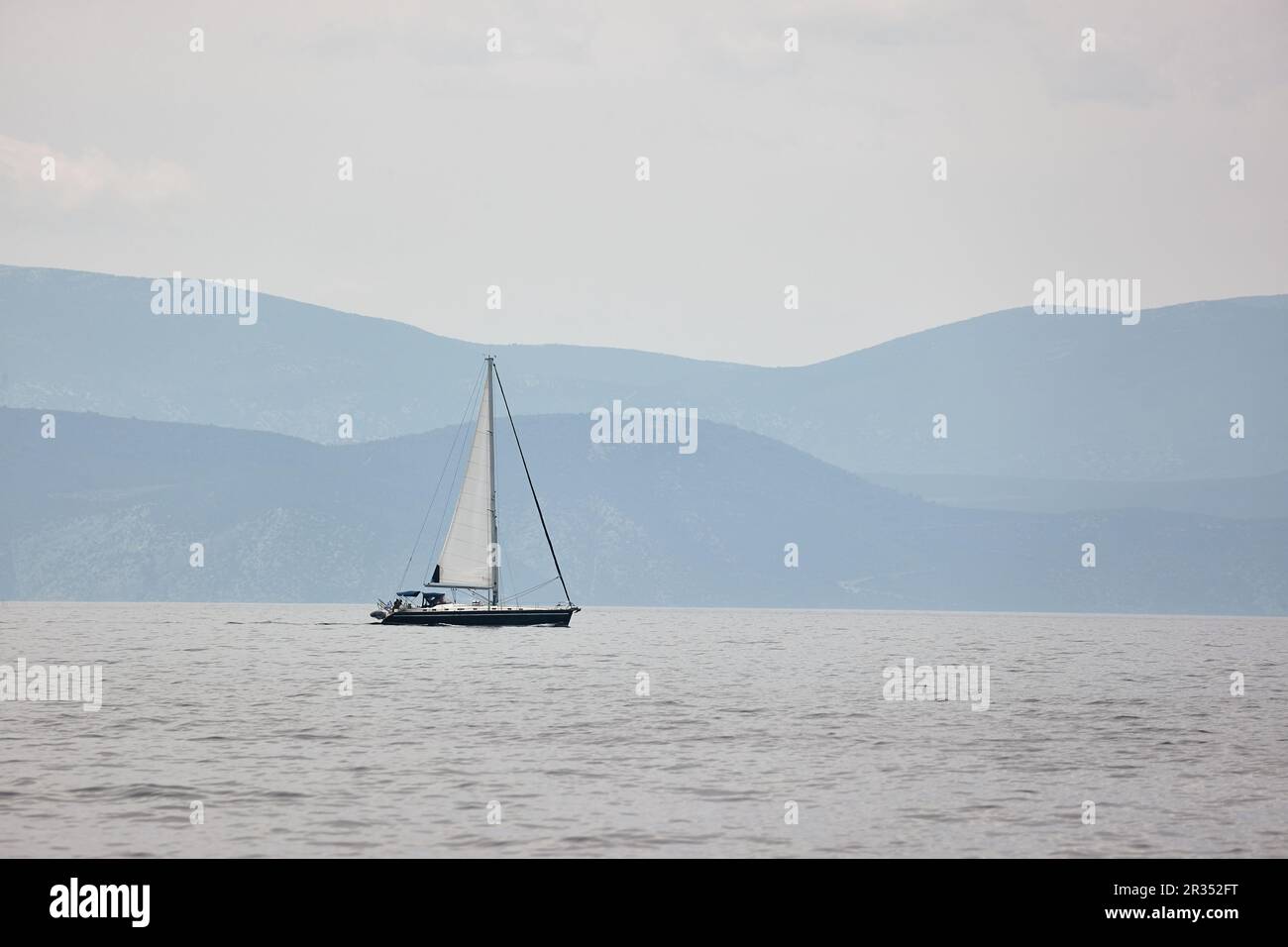 Sailing boat in the distance hi-res stock photography and images - Alamy