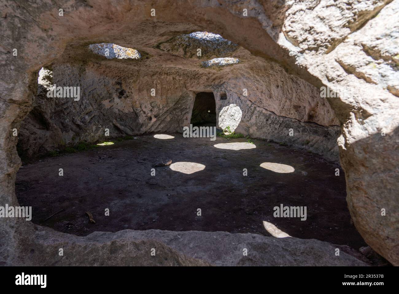 Ancient cave city. Inside the cave, view from the window Stock Photo ...