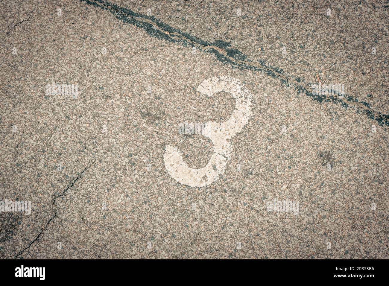 A concrete inscription, etched or painted on surfaces, adding ...