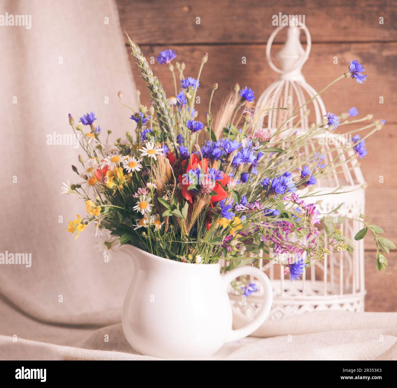 Wildflowers in jug Stock Photo - Alamy