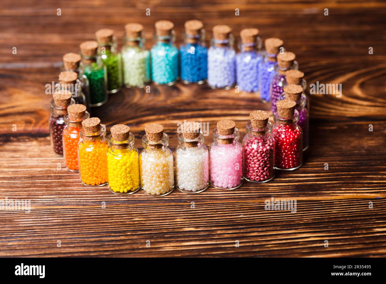 Colorful beads in the bottles Stock Photo - Alamy