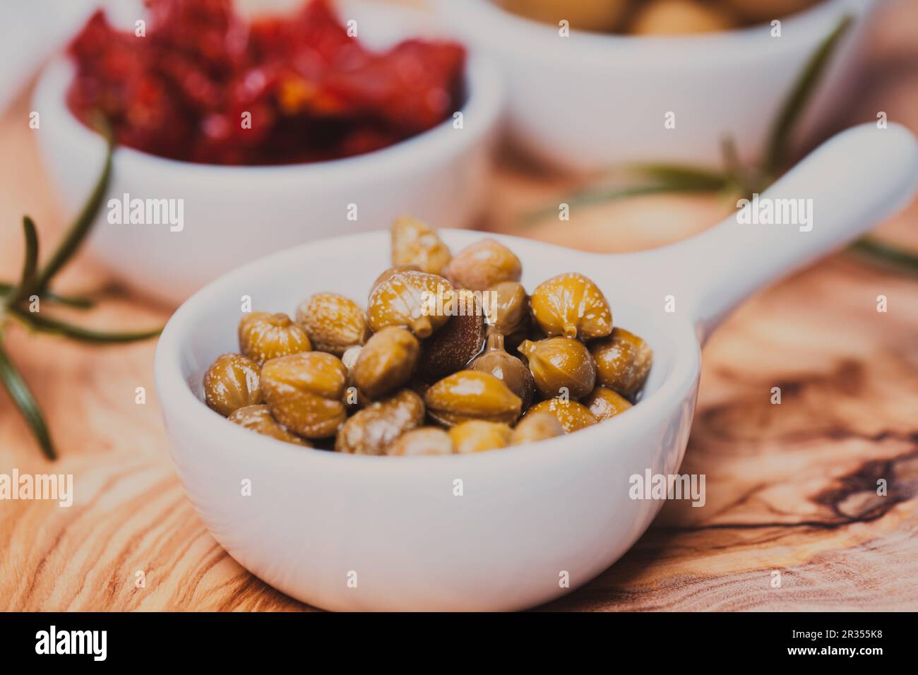 Group of capers hi-res stock photography and images - Alamy