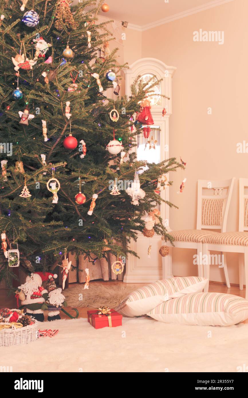 Christmas tree in living room Stock Photo - Alamy