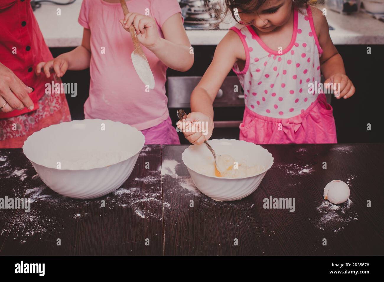 Joyful mother daughter cooking hi-res stock photography and images - Alamy