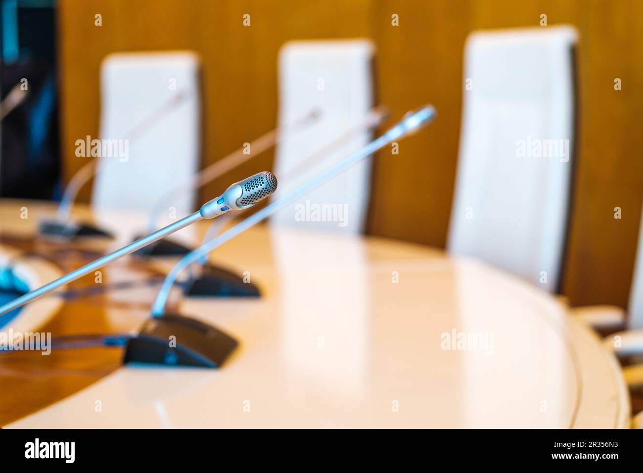 Details of interior of conference room with table microphones Stock ...