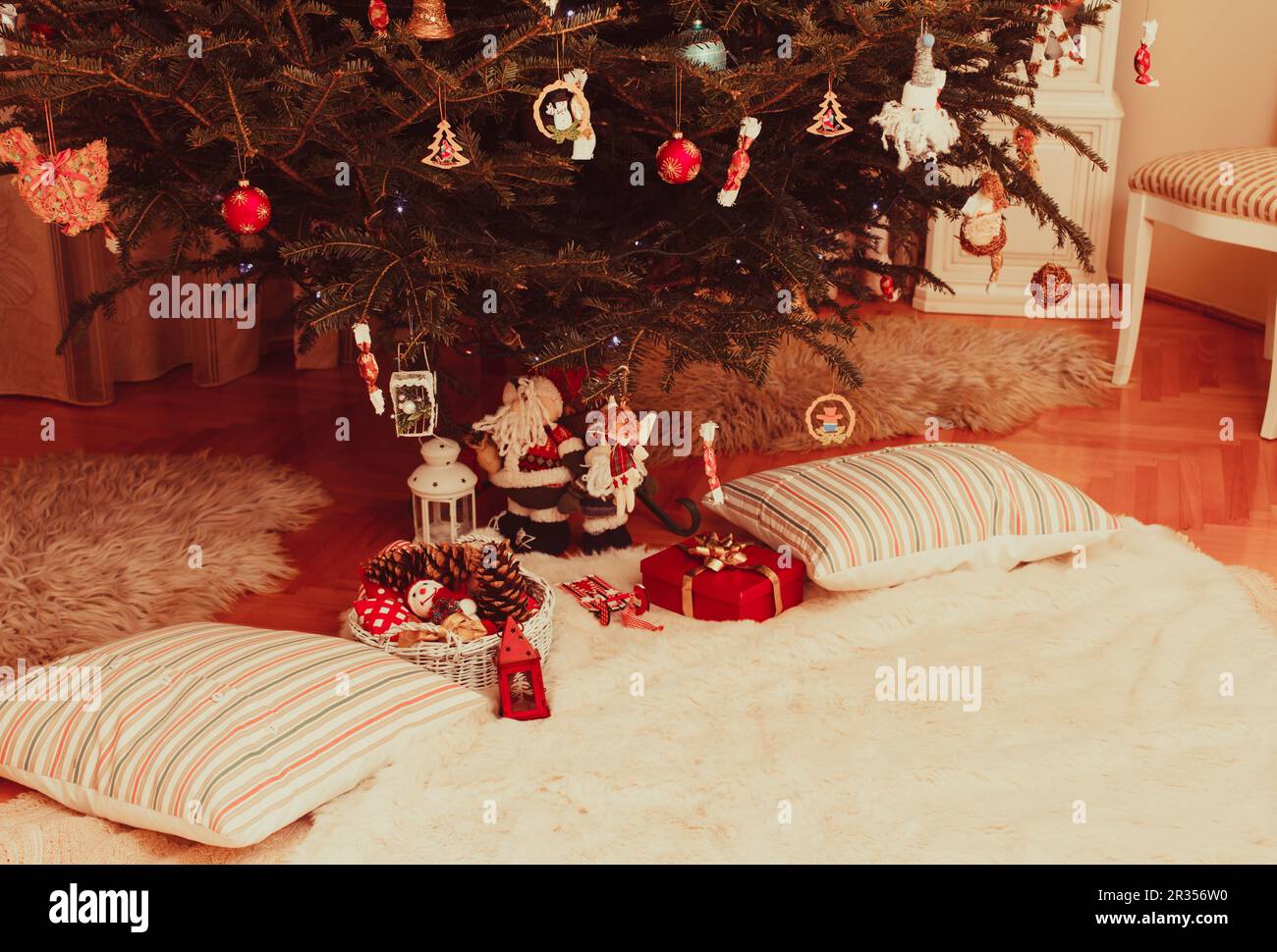 Christmas tree in living room Stock Photo - Alamy