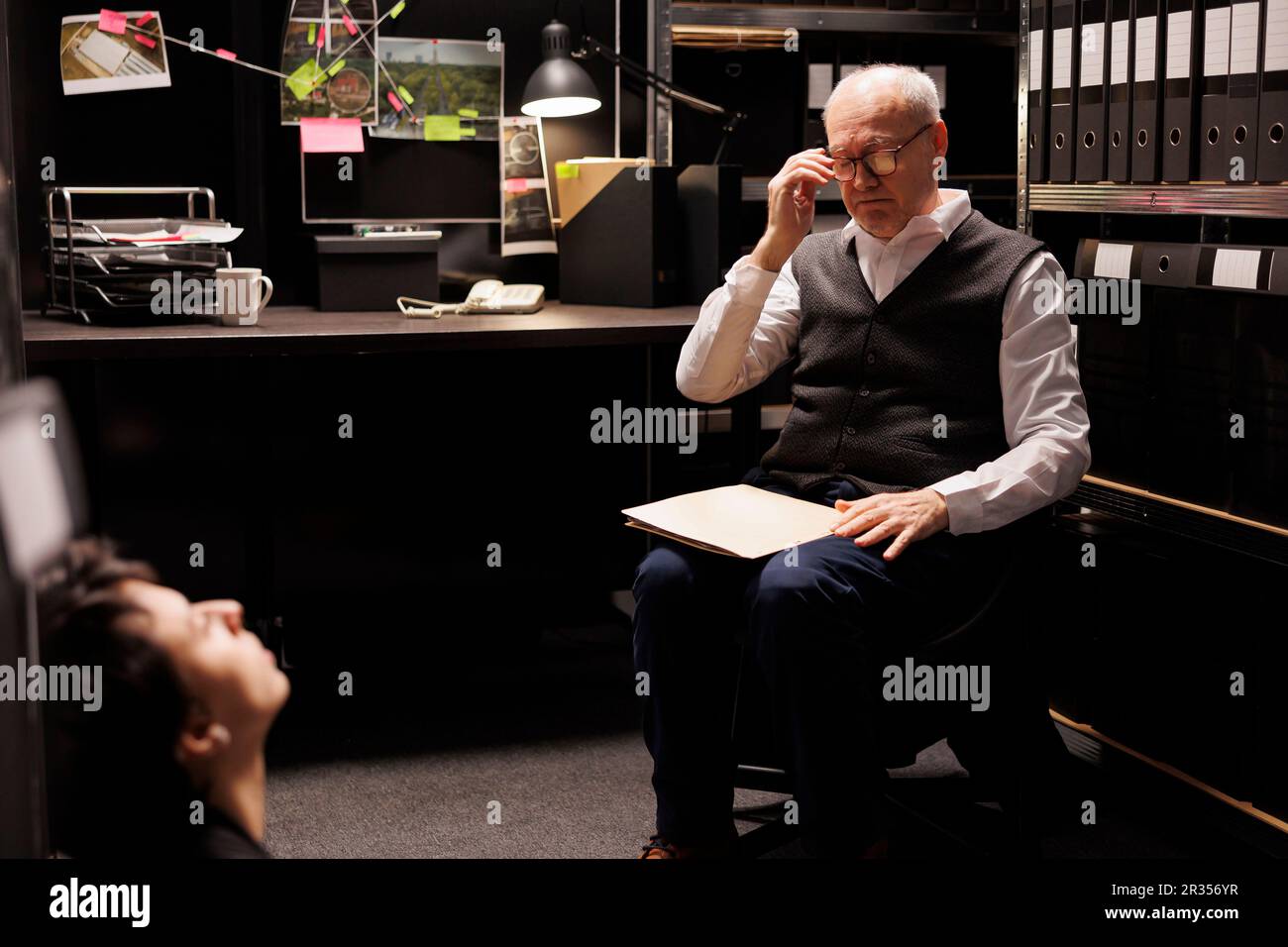 Police officers working overtime at missing person case Stock Photo - Alamy