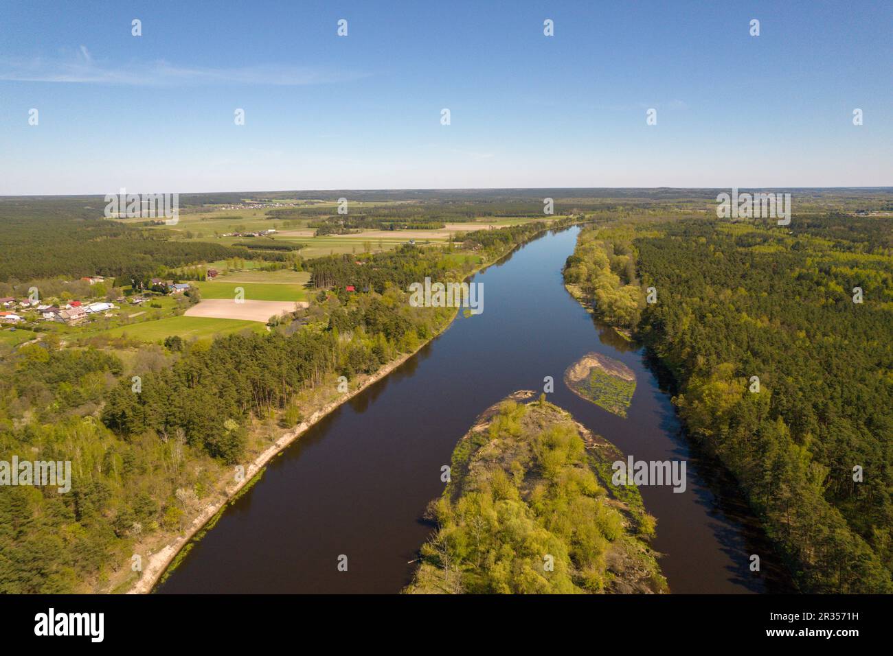 The Bug River in Drochiczyn. View of the escarpment with the city ...