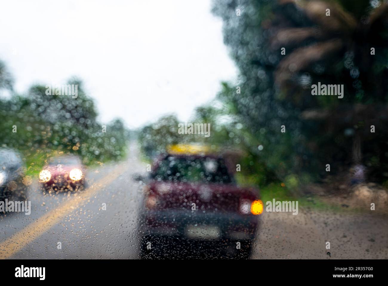 View of traffic, cars and lights from inside a car. Rainy day Stock ...