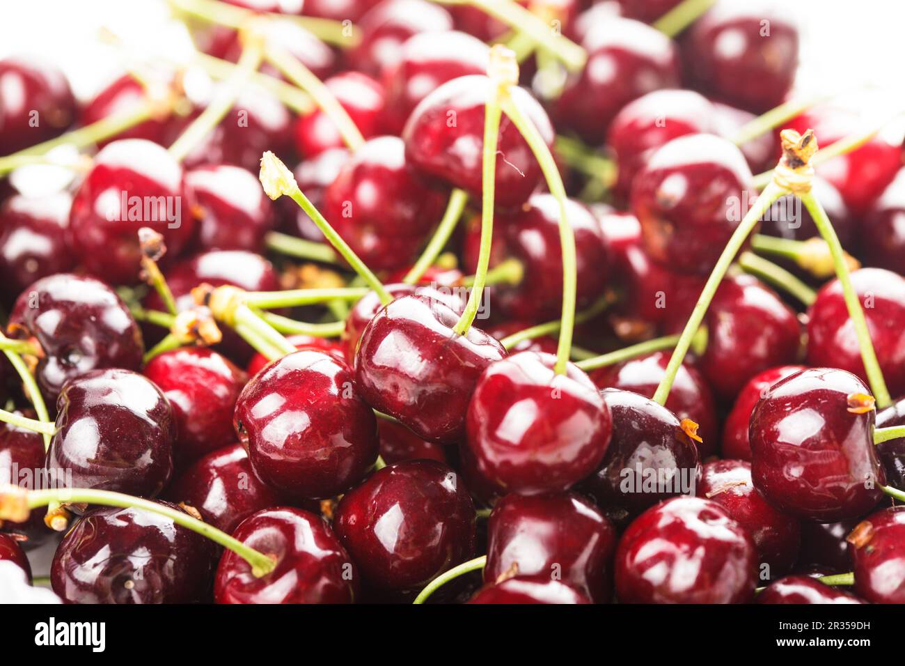 Sweet cherry background Stock Photo - Alamy