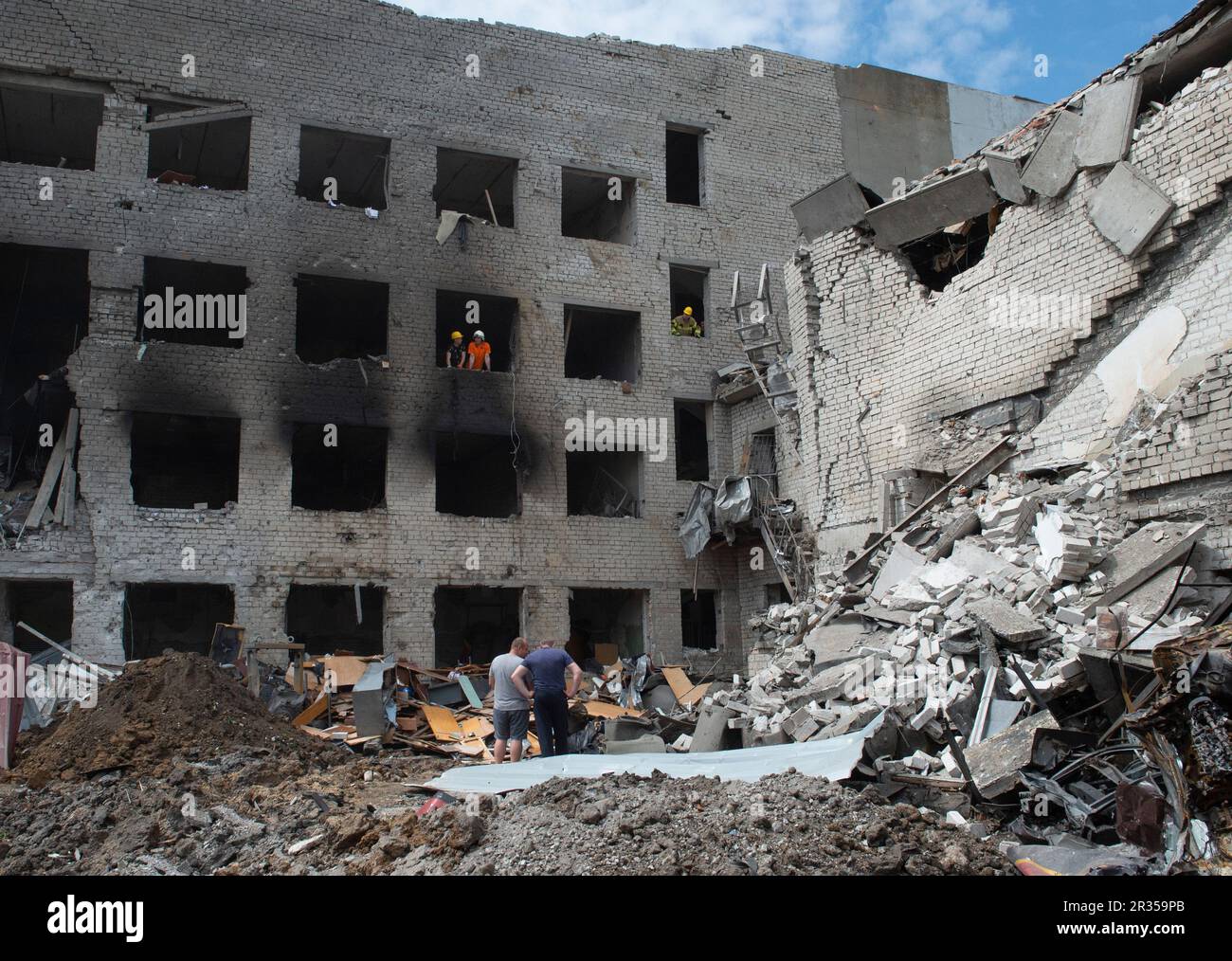 Dnipro, Ukraine. 21st May, 2023. Firefighters, police, and emergency ...