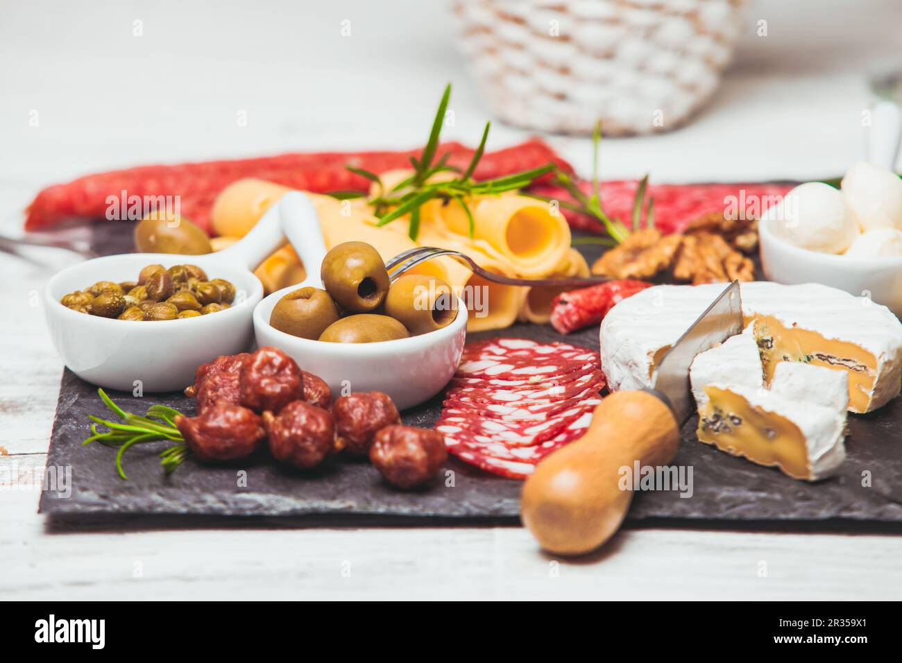 Cheese and salami plate Stock Photo - Alamy