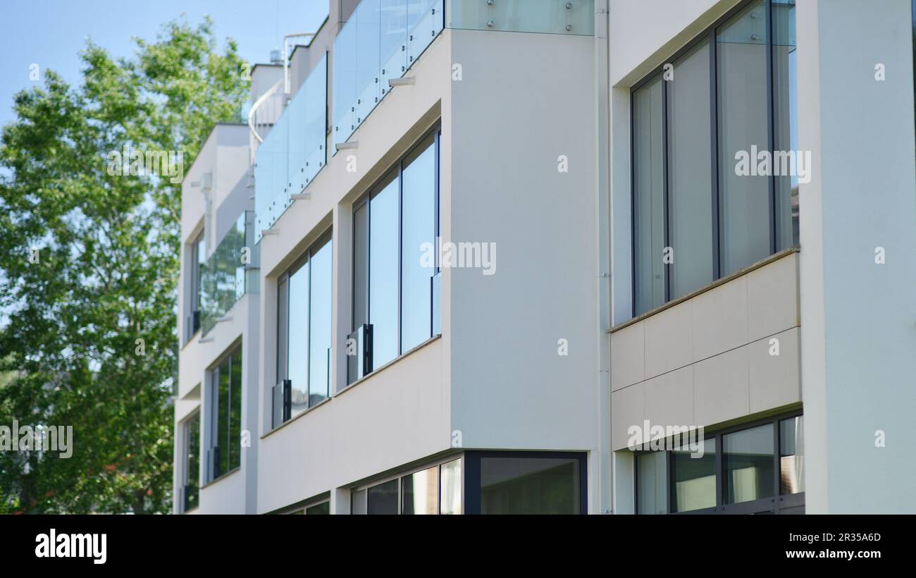 White apartment complex. A small fragment of a modern apartment ...