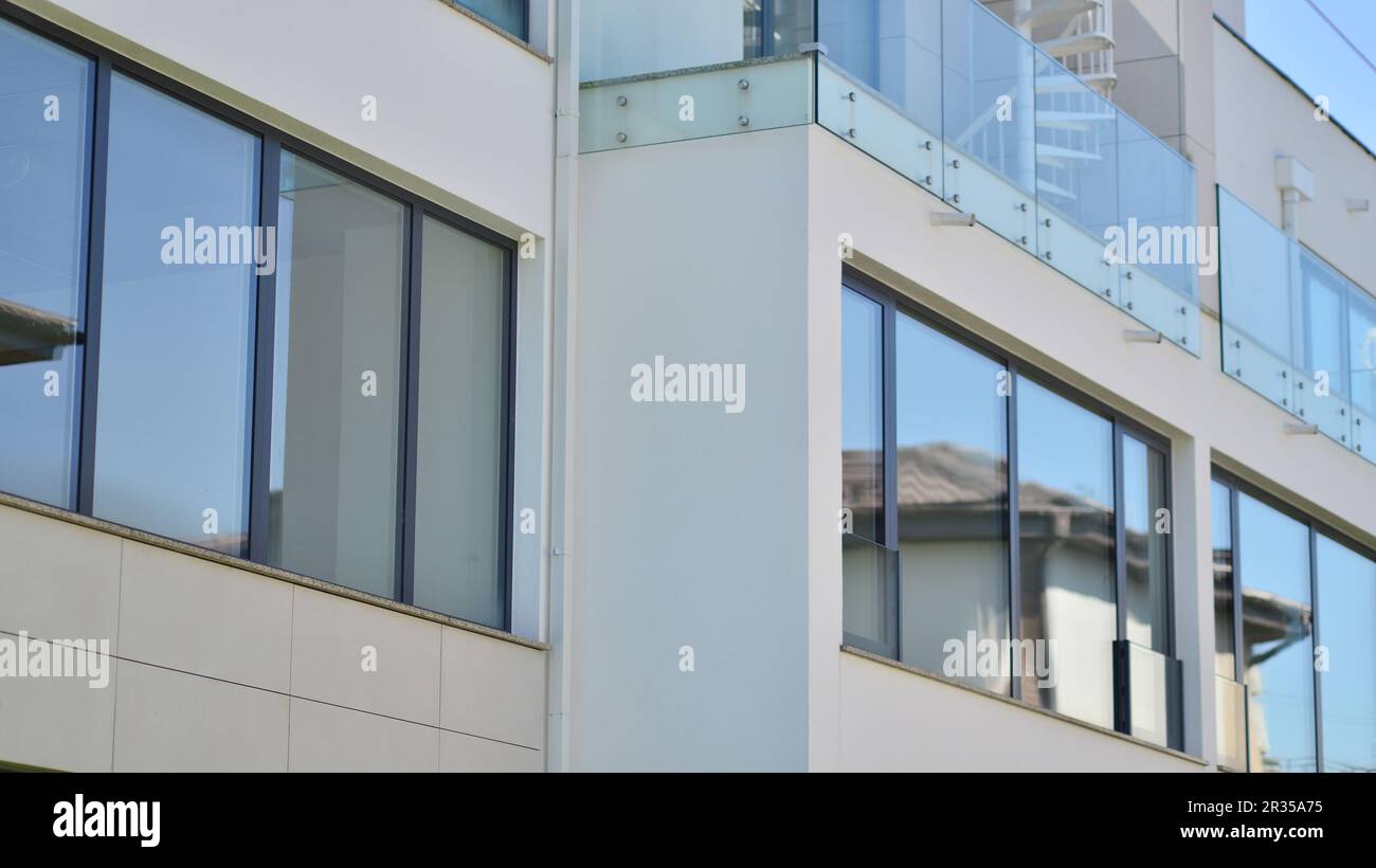 White apartment complex. A small fragment of a modern apartment ...